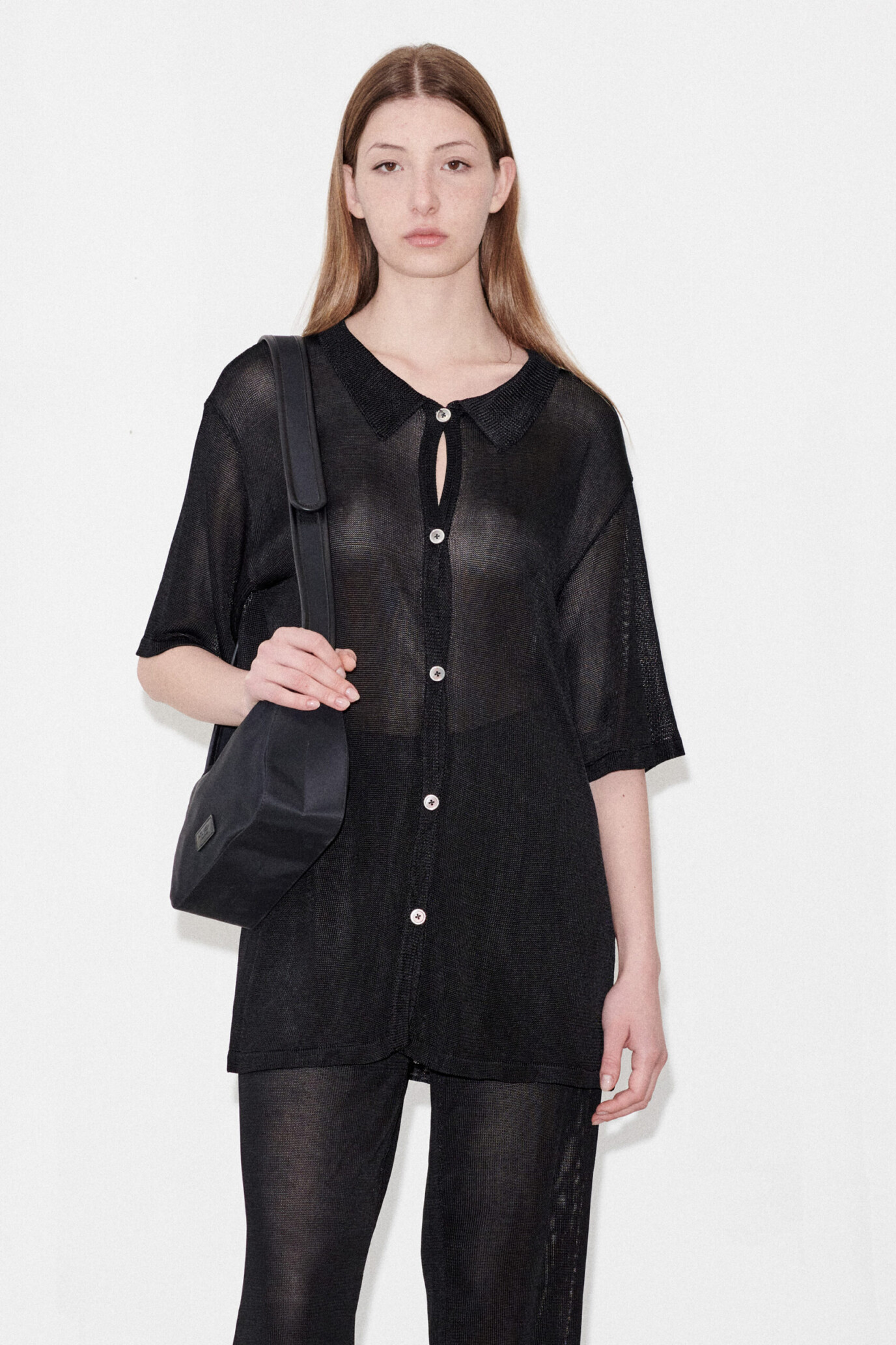 Designer Knitwear & Handbags | • TL 180